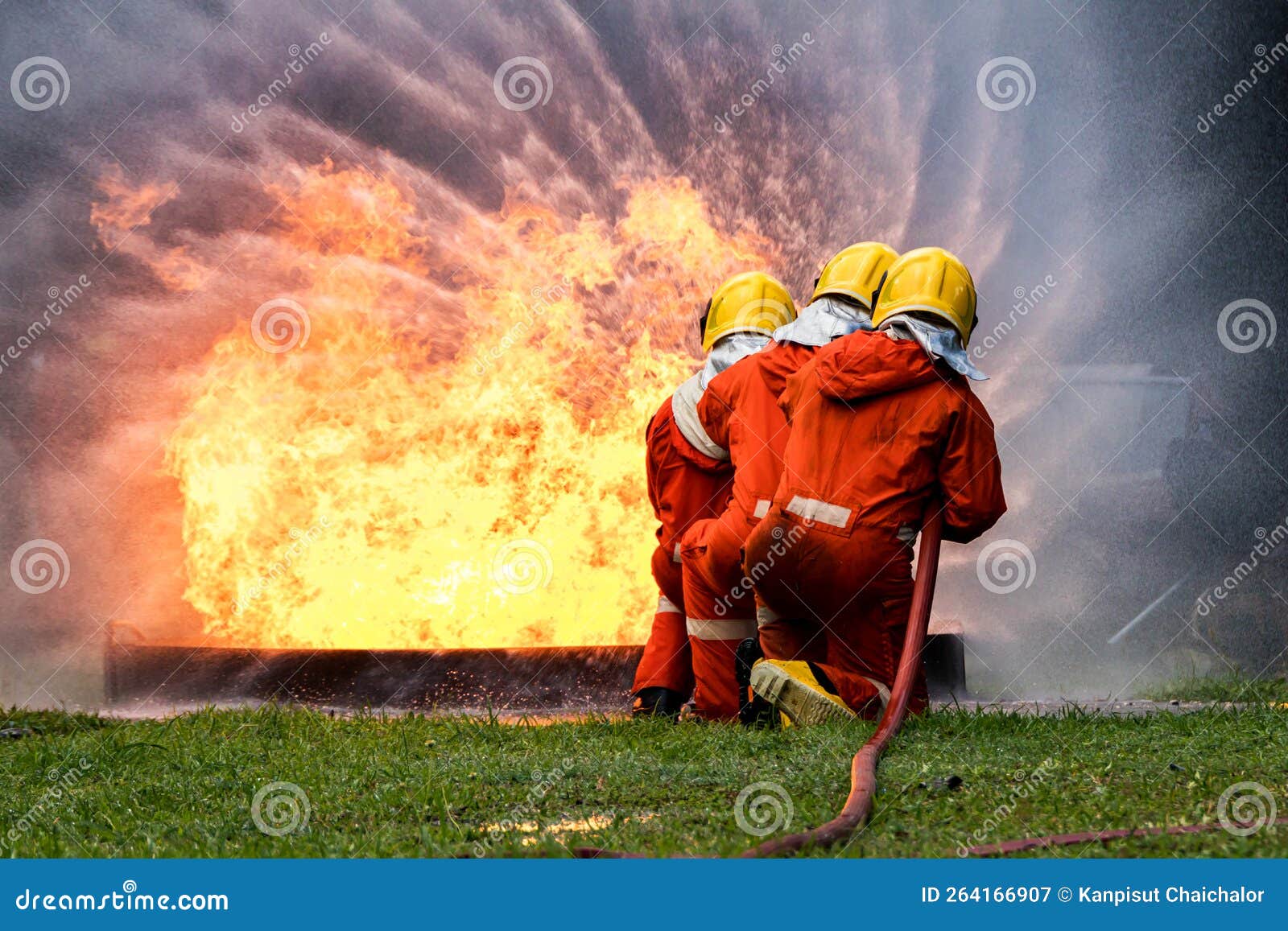 Firefighter Concept. Fireman Using Water And Extinguisher To Fighting ...