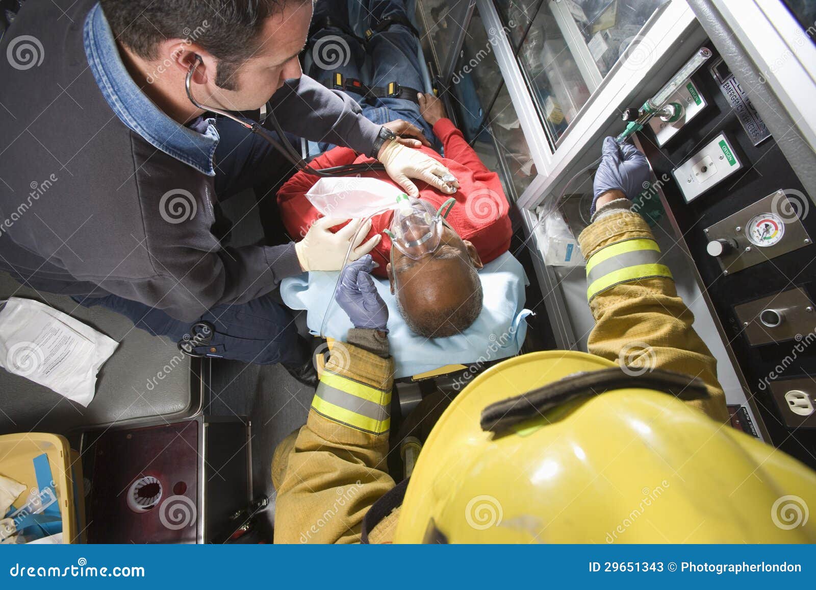 Firefighter And Doctor Taking Care Of Senior Man Stock Image - Image ...