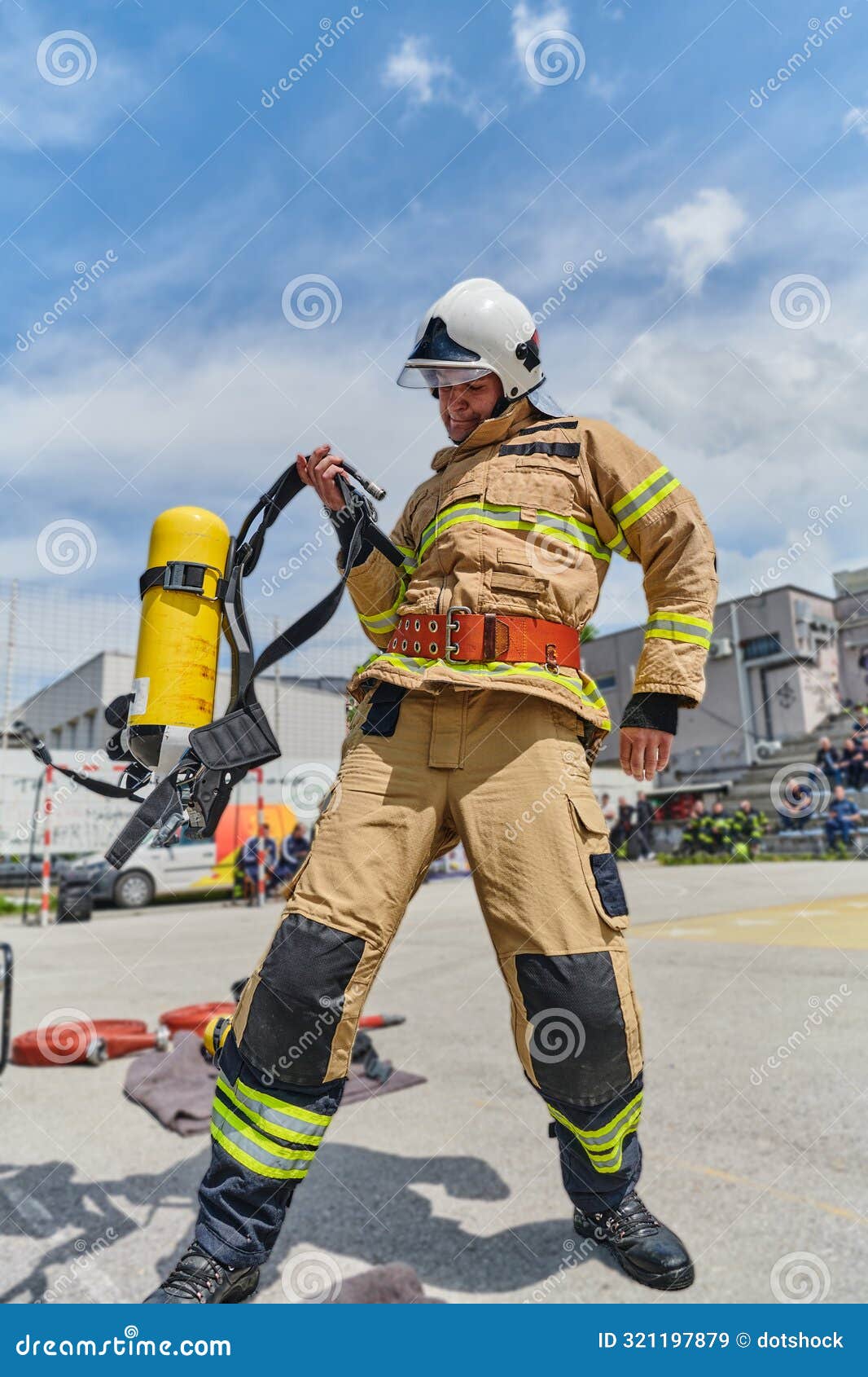A Firefighter Dons the Essential Components of Their Professional Gear ...