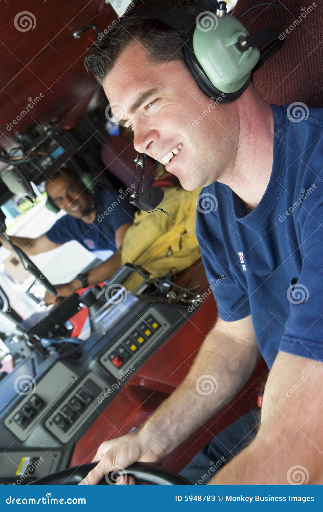 A Firefighter Driving a Fire Engine Stock Image - Image of role ...