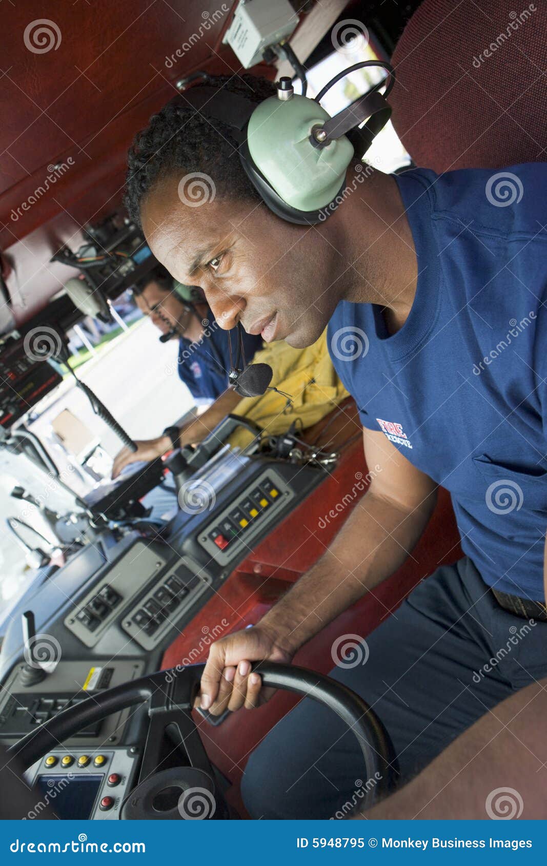 A Firefighter Driving a Fire Engine Stock Image - Image of driver ...