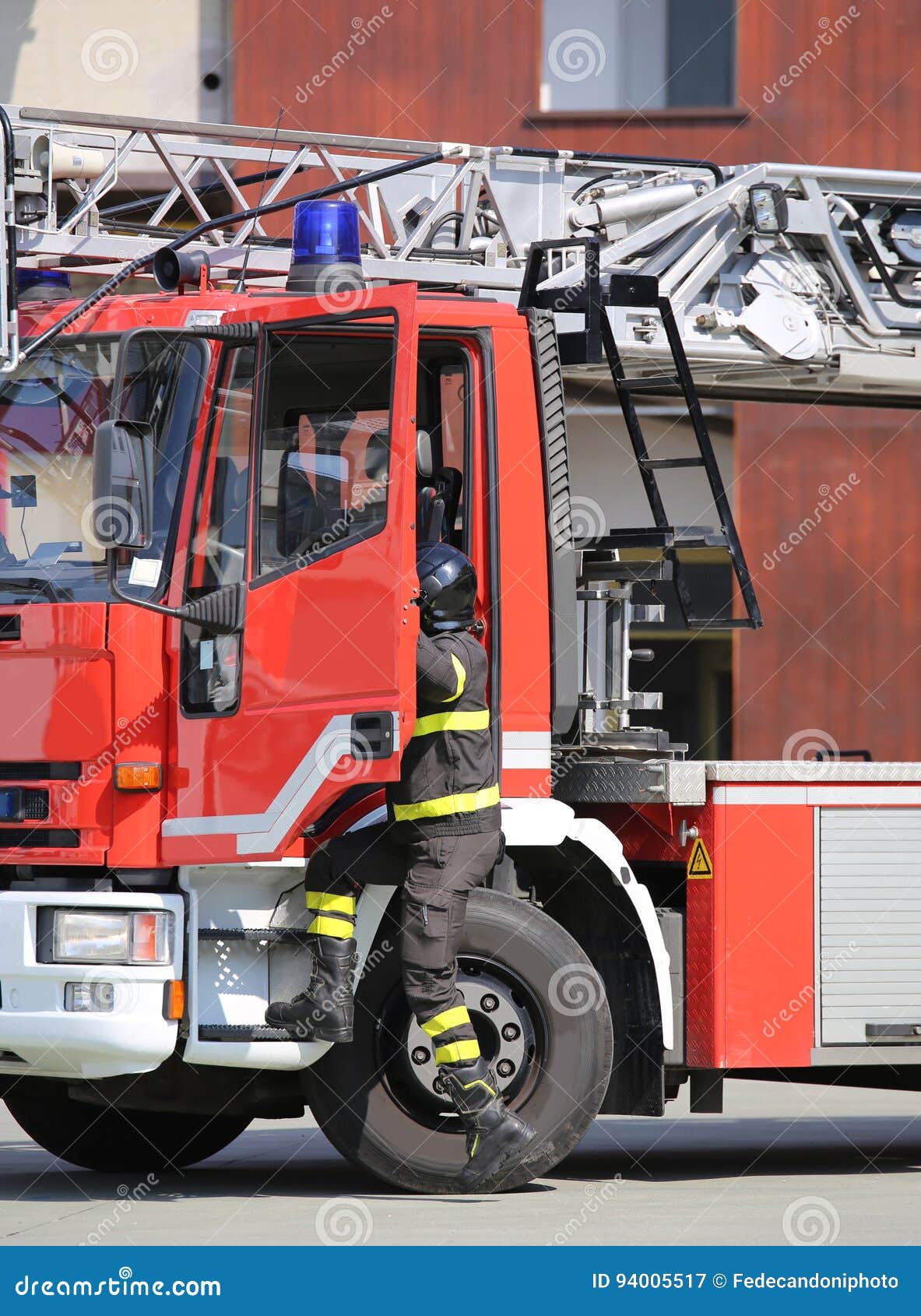 Firefighter Drops Fast from the Fire Truck during Firefighting Stock ...