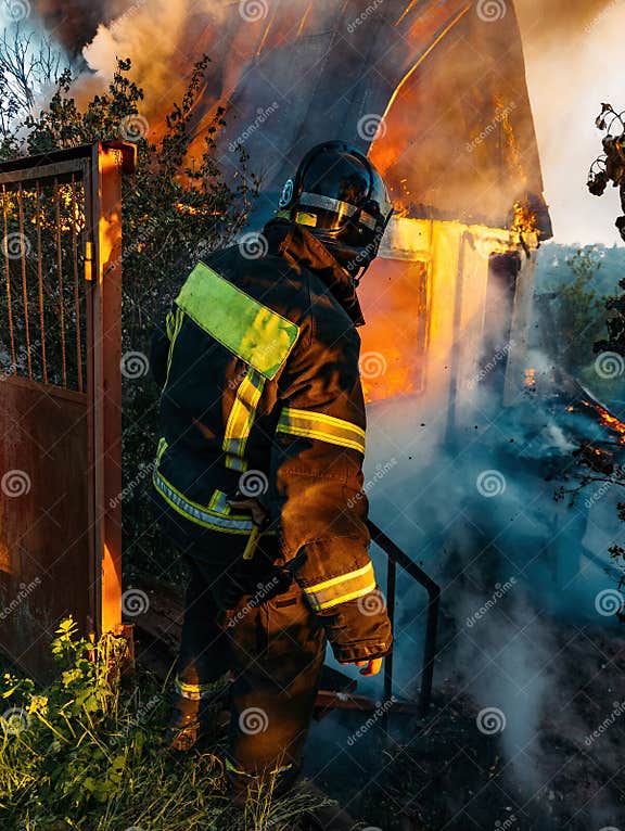 Firefighter Extinguish Fire in House Using Spraying Hose Stock Image ...