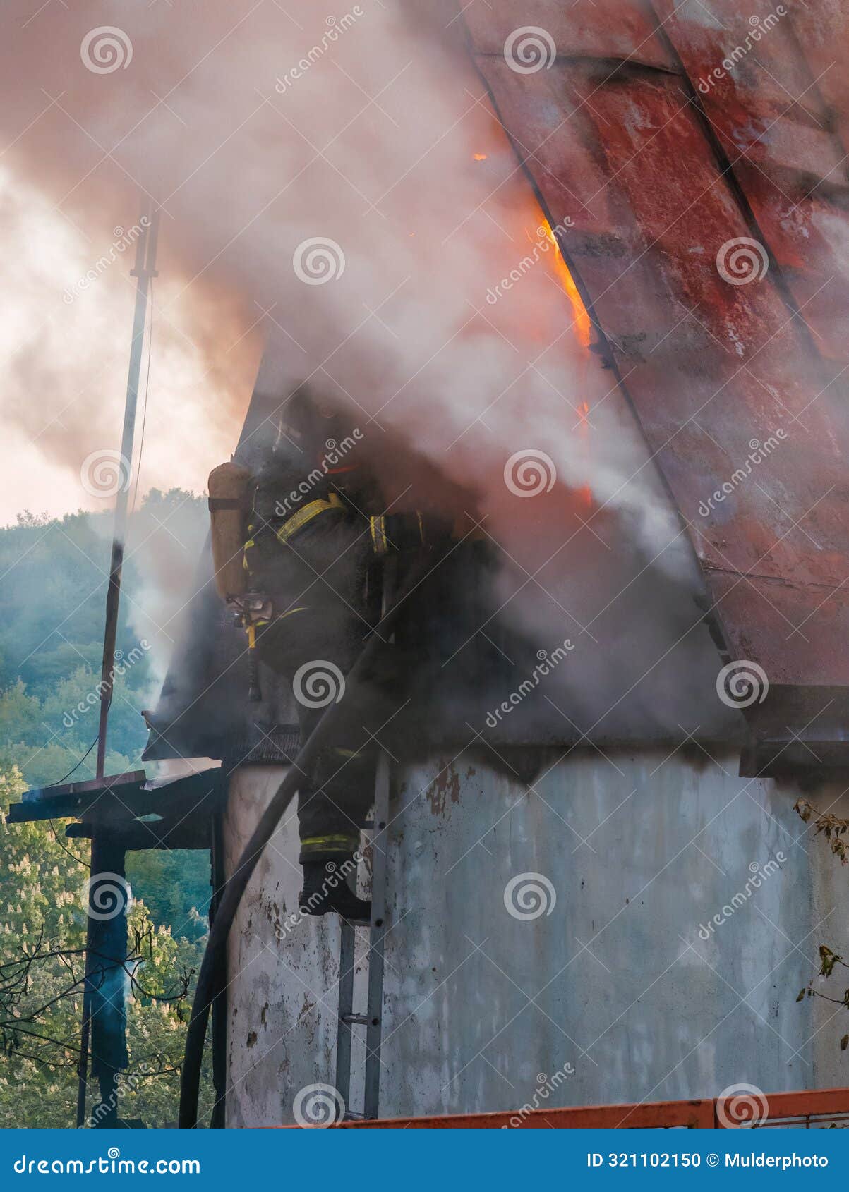 Firefighter Extinguish Fire in House Using Spraying Hose Stock Photo ...