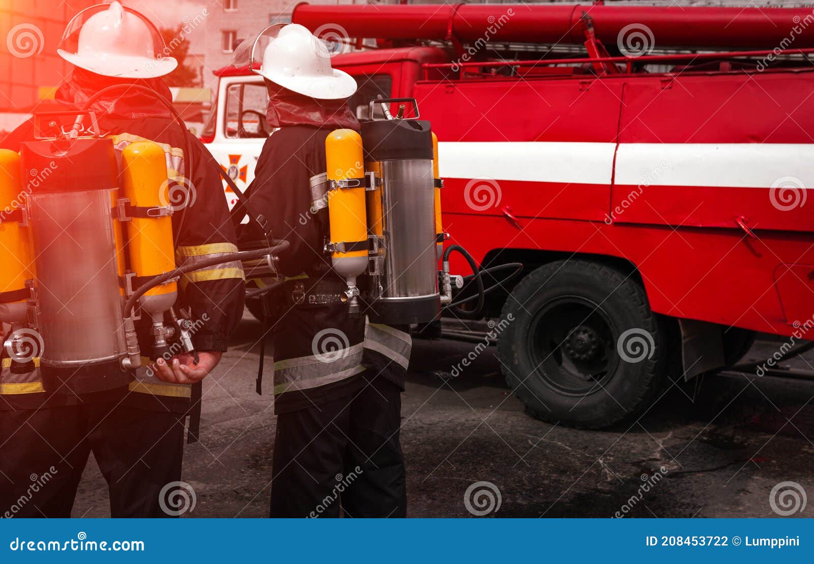 Firefighter Extinguishes the Fire with Smoke Stock Photo - Image of ...