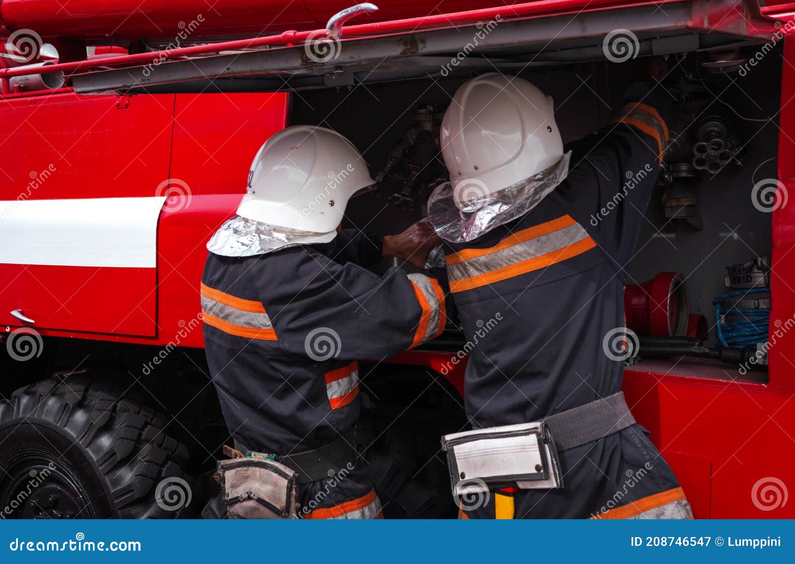 Firefighter Extinguishes the Fire with Smoke Stock Image - Image of ...