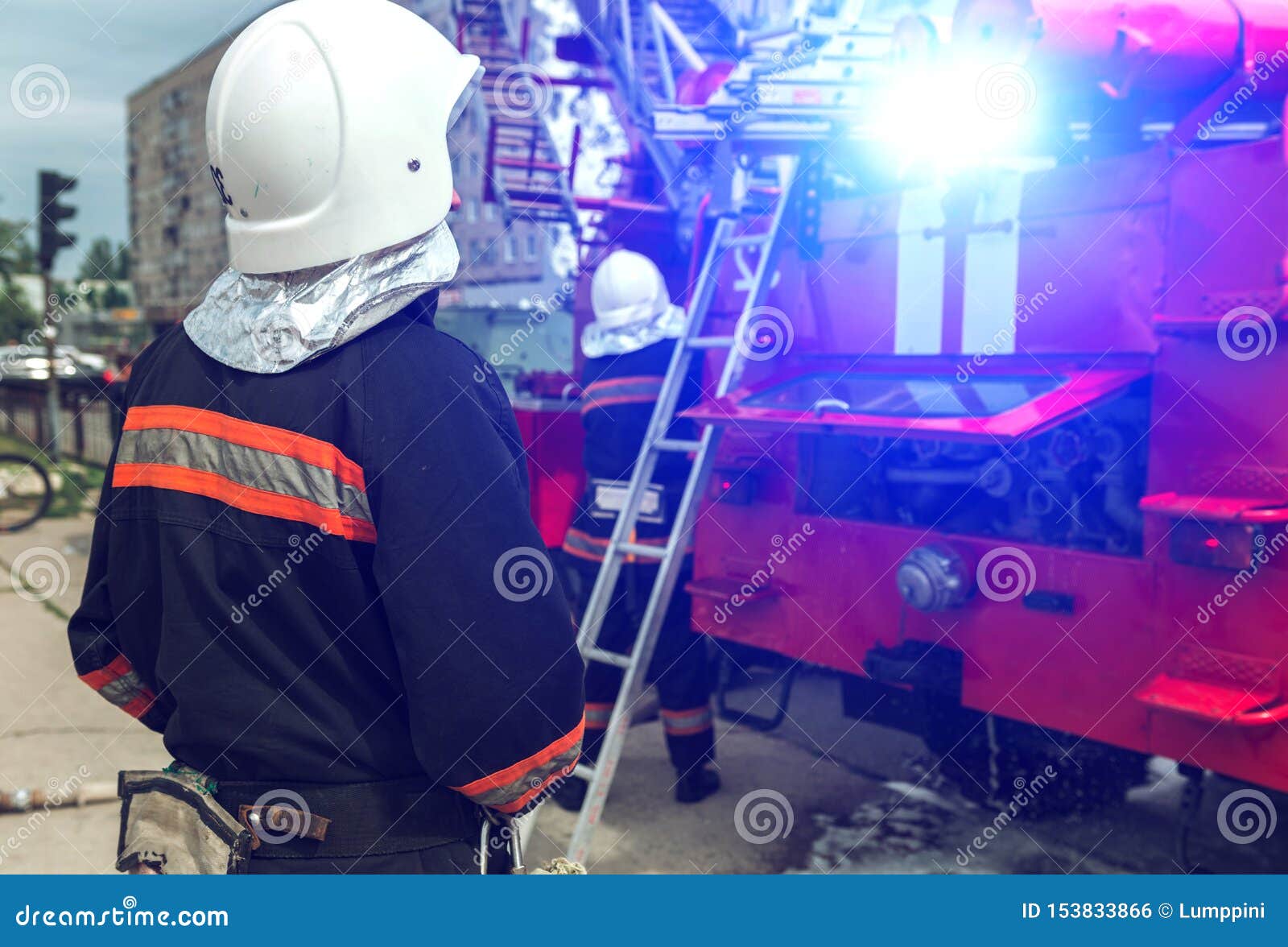 Firefighter Extinguishes the Fire with Smoke Stock Photo - Image of ...