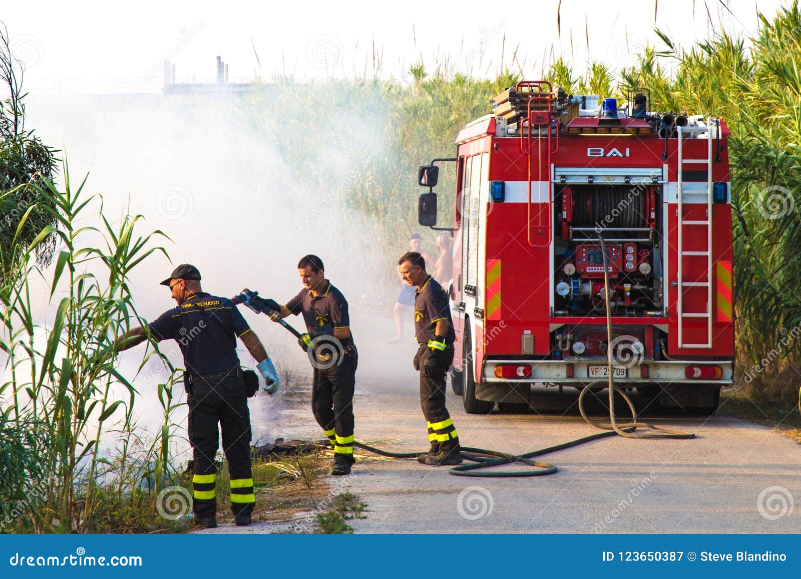 Firefighter Extinguishing Fire in Sicily Editorial Photography - Image ...