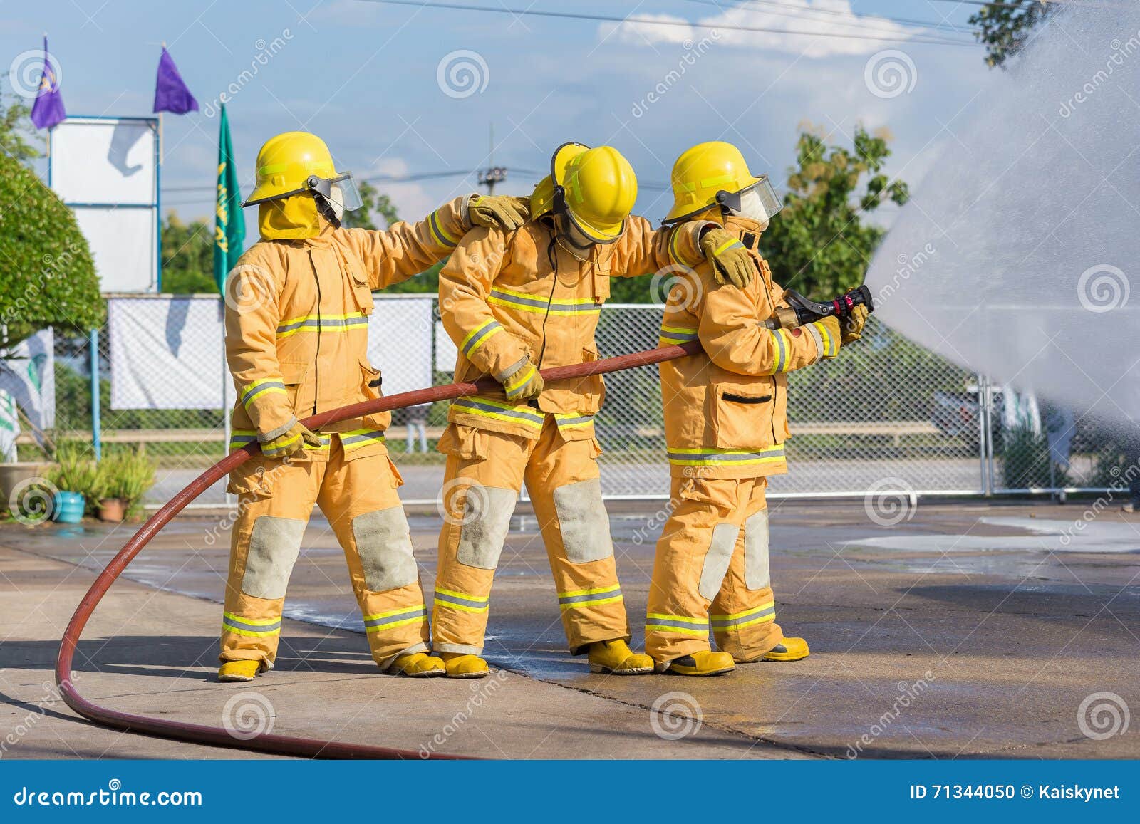 Firefighter Fighting for a Fire Attack Stock Photo - Image of coat ...