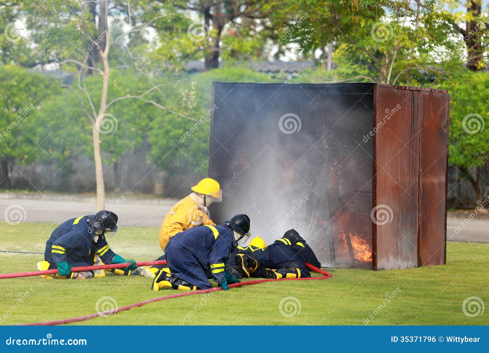 Firefighter Fighting for Fire Attack Training Stock Photo - Image of ...
