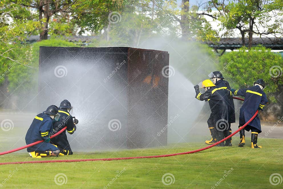 Firefighter Fighting for Fire Attack Training Stock Photo - Image of ...