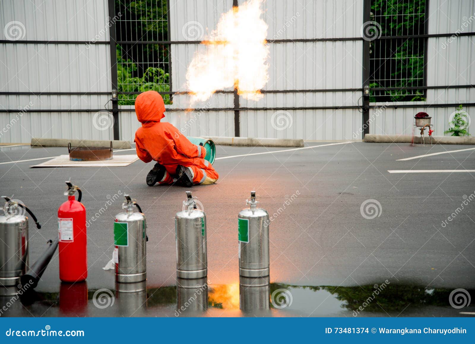 Firefighter Fighting Fire during Training Officer Stock Photo - Image ...