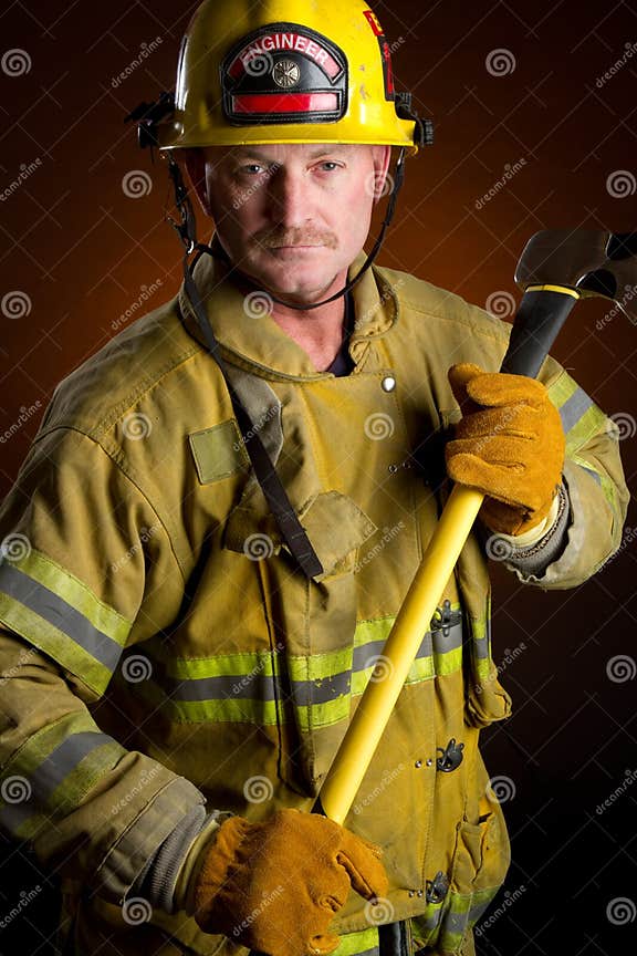 Firefighter Fireman stock image. Image of handsome, helmet - 14000523