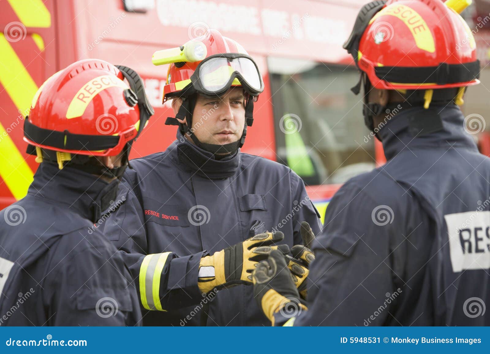 A Firefighter Giving Instructions To His Team Stock Image - Image of ...