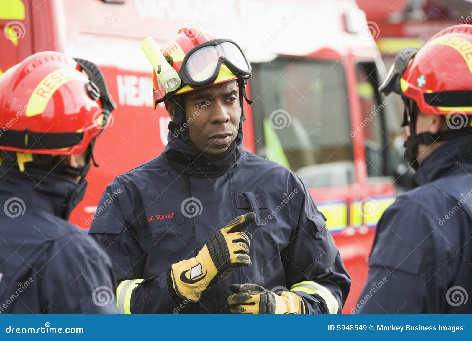 A Firefighter Giving Instructions To His Team Stock Image - Image of ...