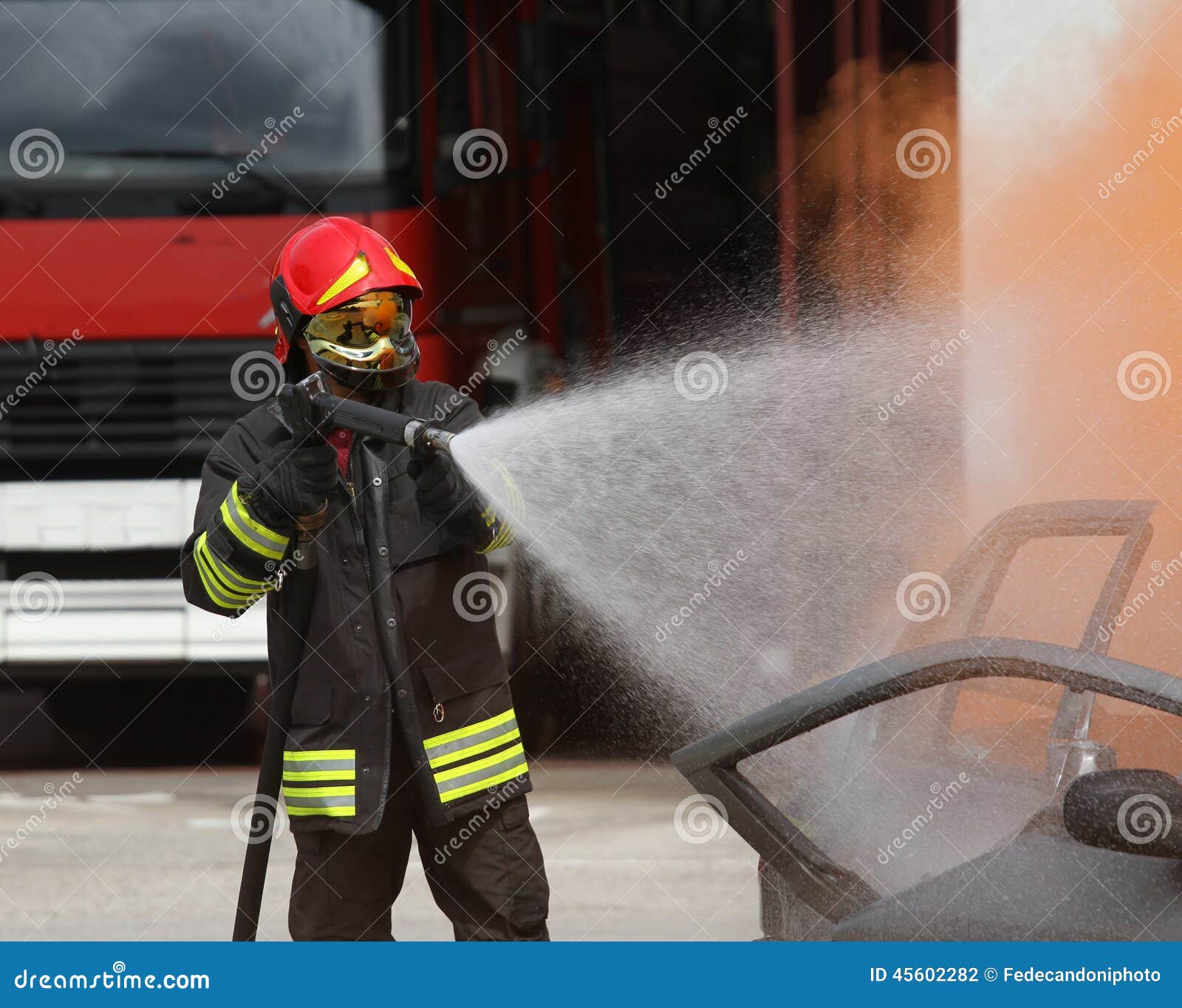 Firefighter with Helmet Off the Car Burned with the Foam Editorial ...