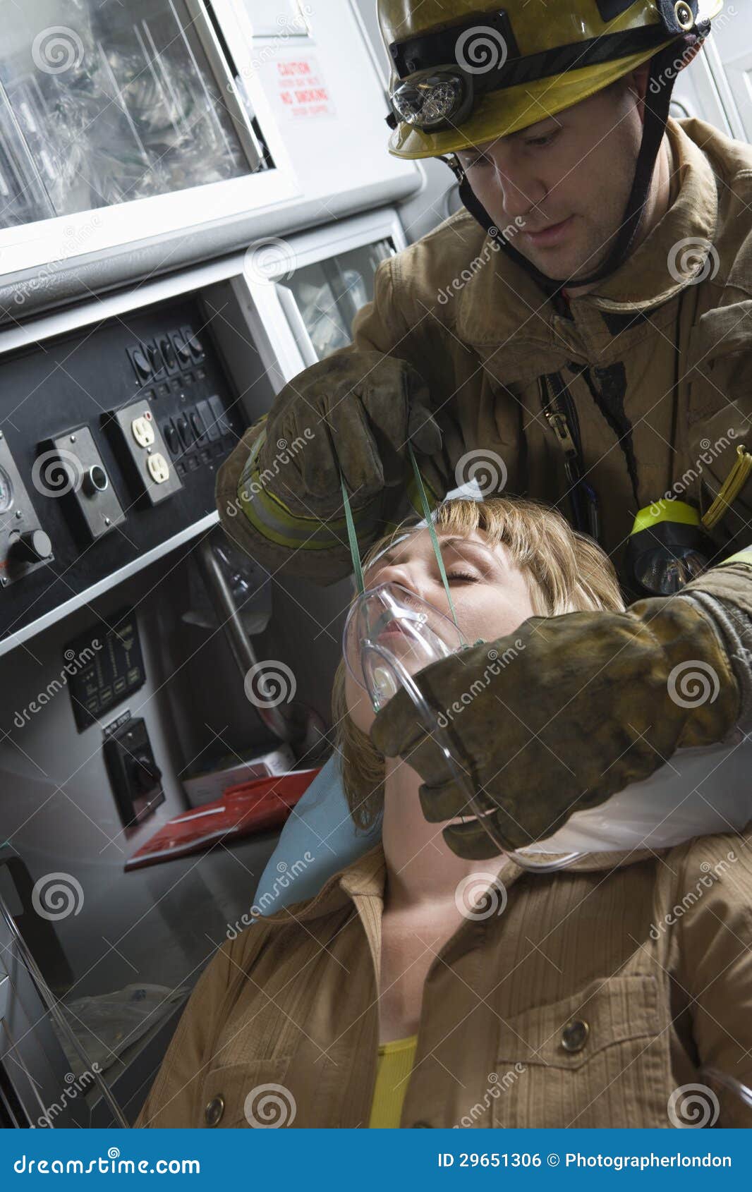 Firefighter Helping an Injured Woman Stock Photo - Image of health ...