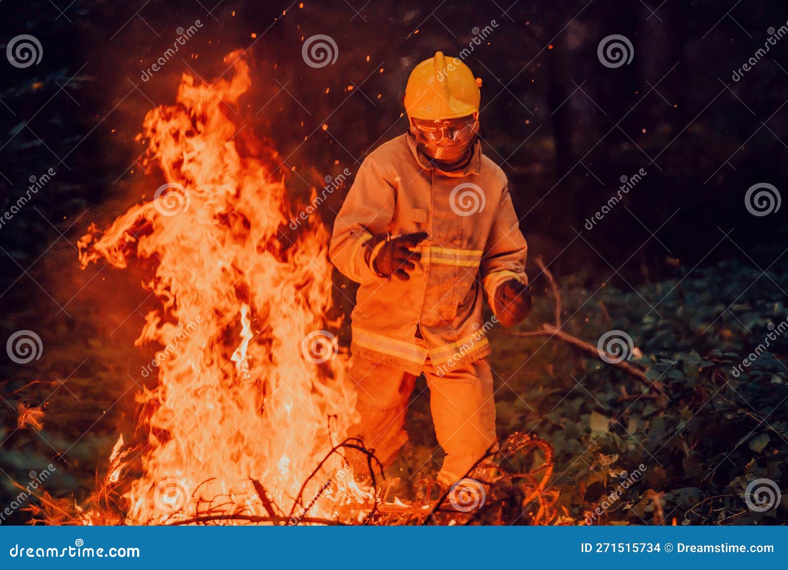 The Hero Firefighter Stands Among The Smoke And Fire And Extinguishes ...
