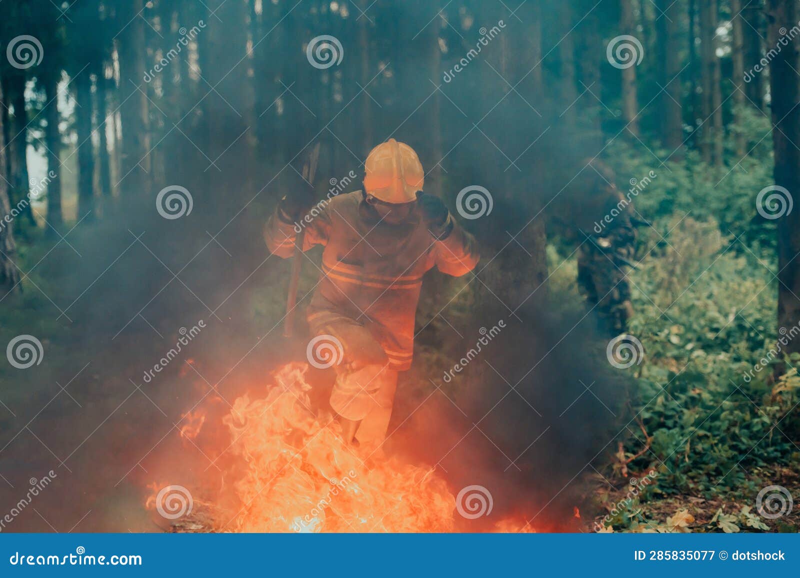 Firefighter Hero in Action Danger Jumping Over Fire Flame To Rescue and ...