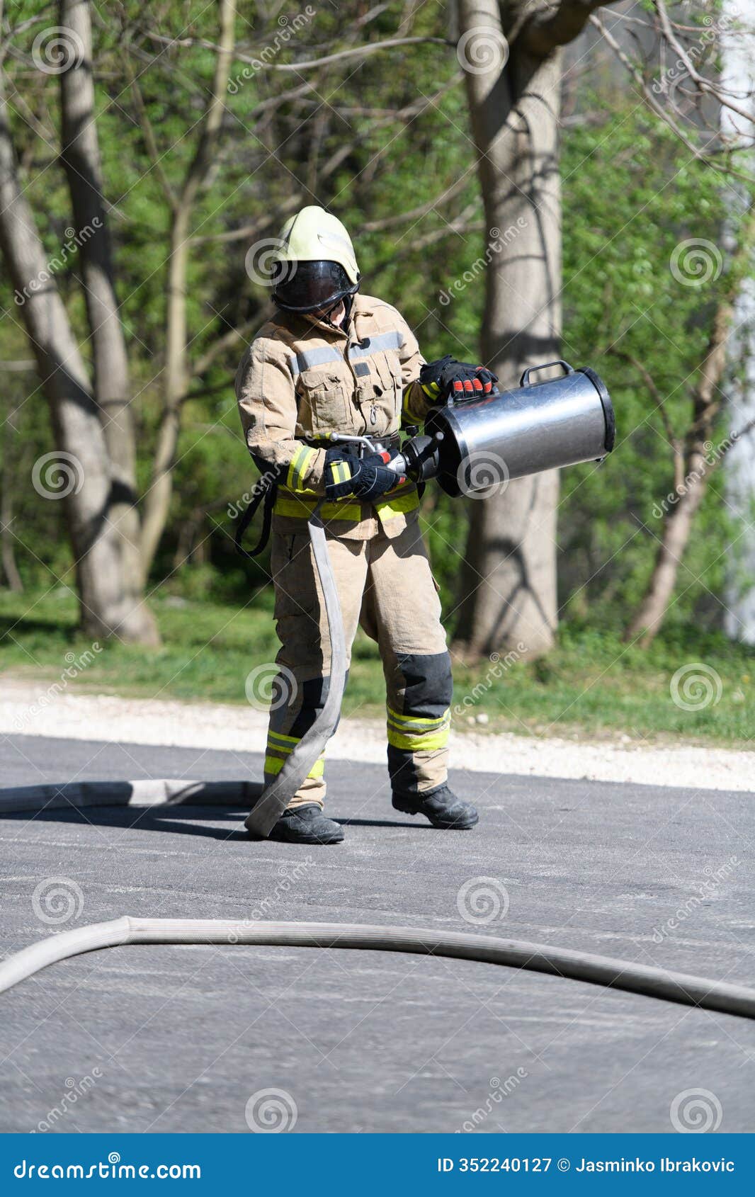 Firefighter Holding Foam Suppression Tool on Duty Editorial Photography ...