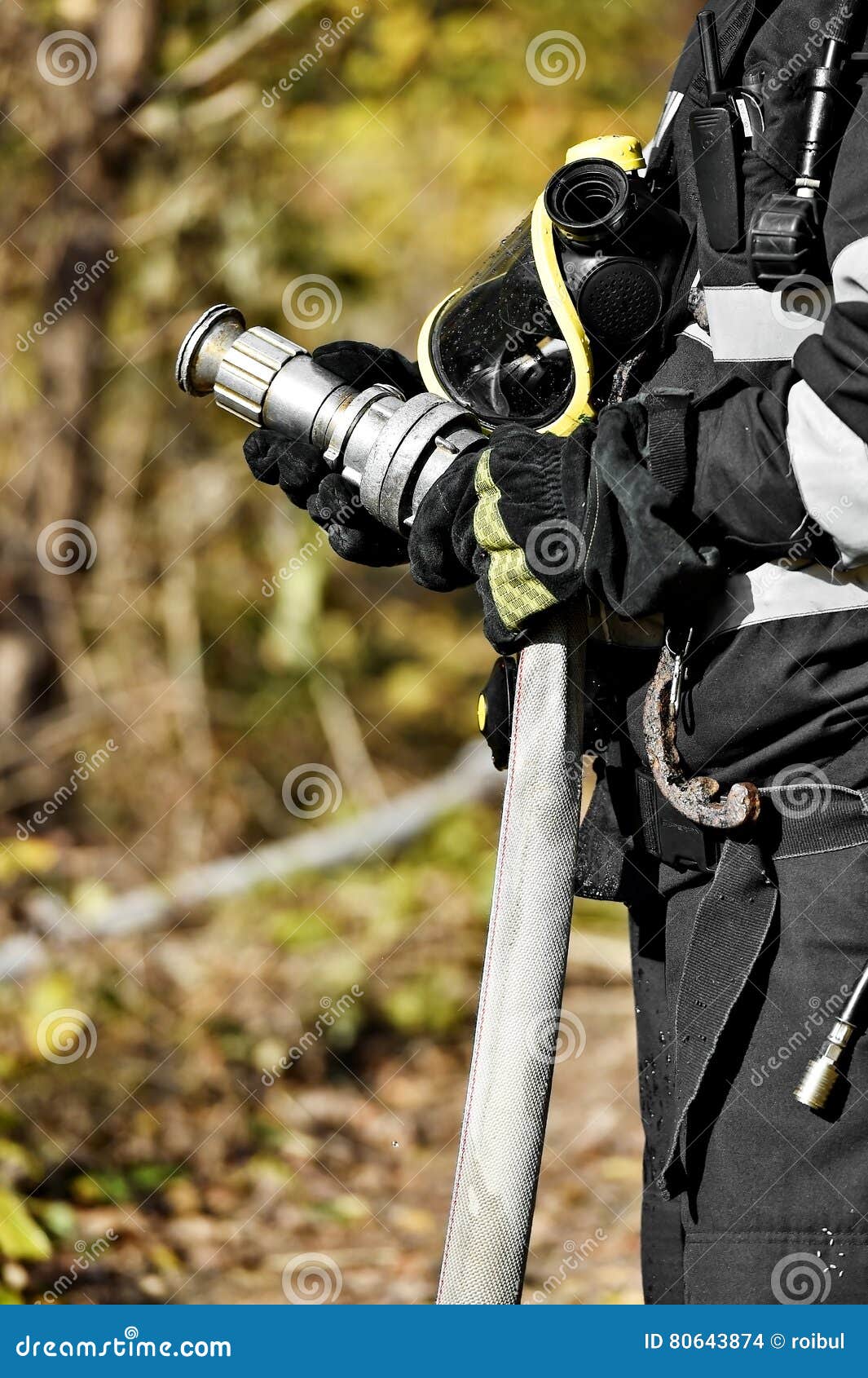Firefighter Holding Water Hose Stock Photo - Image of industrial ...