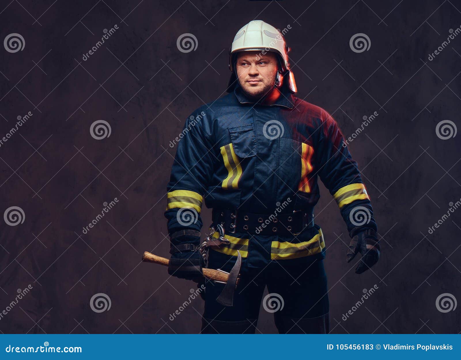 Firefighter holds the axe. stock image. Image of fireman - 105456183