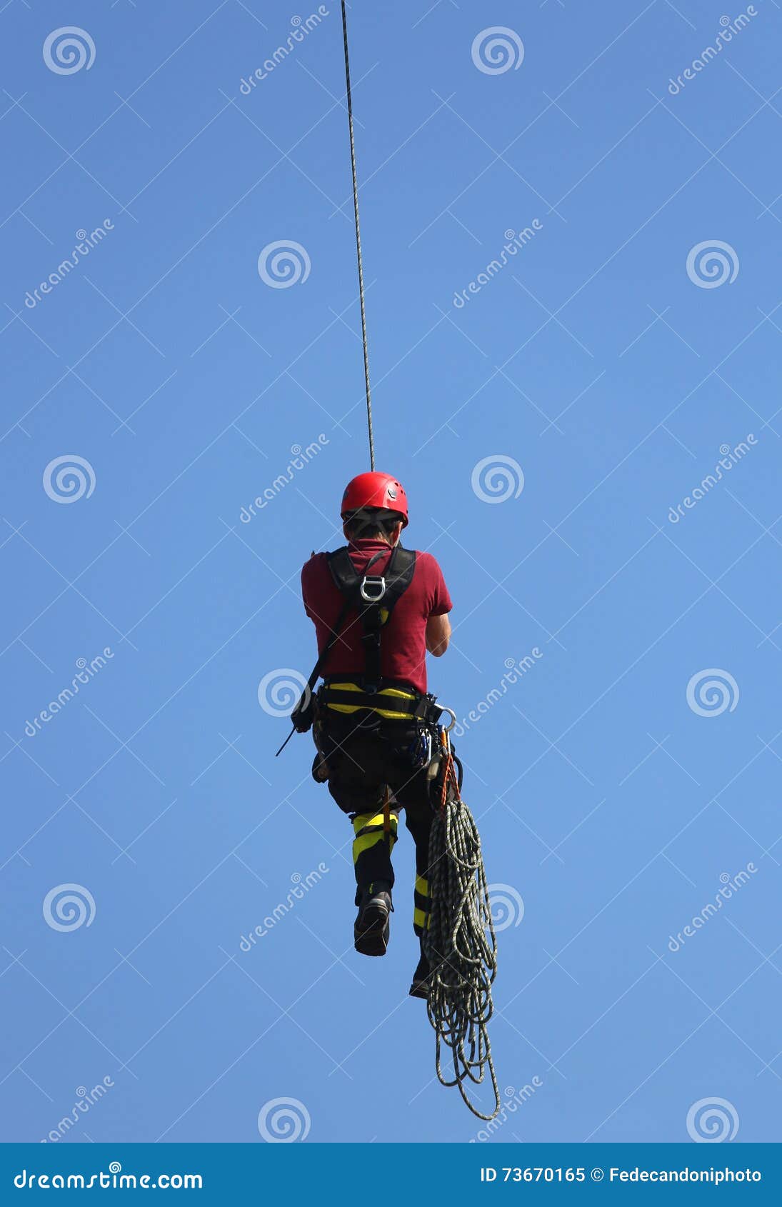 Firefighter Hung The Rope Climbing In The Firehouse Stock Photo ...
