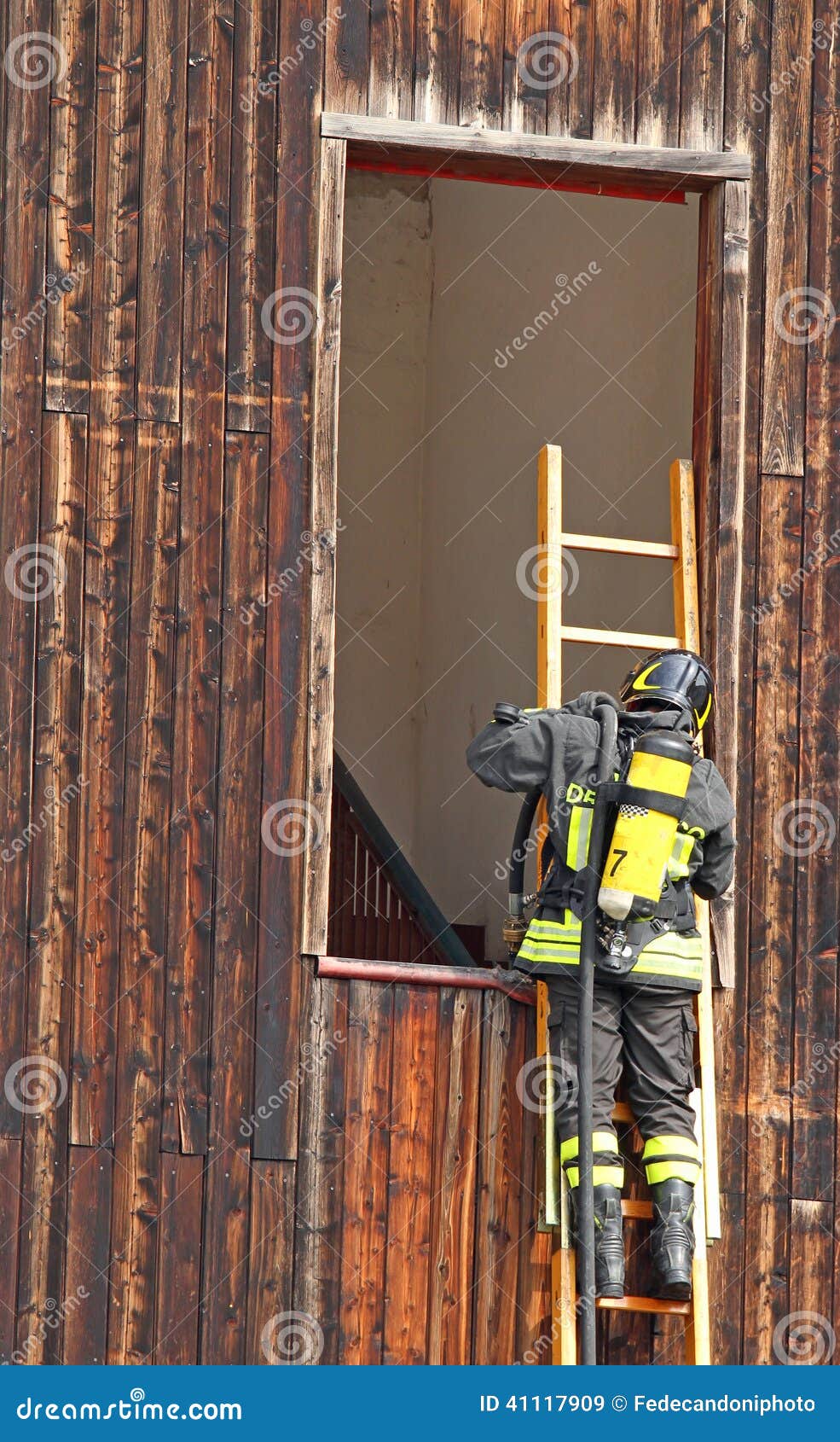 Firefighter with Ladder and the Oxygen Cylinder Stock Image - Image of ...