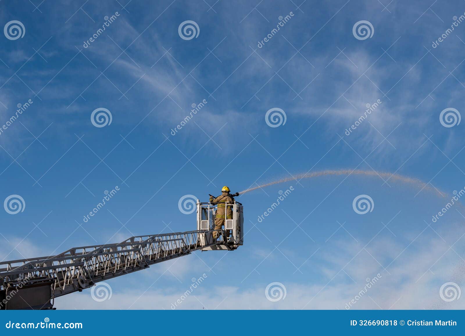 Firefighter on Ladder, Spraying Water on Fire, Side View Stock Photo ...