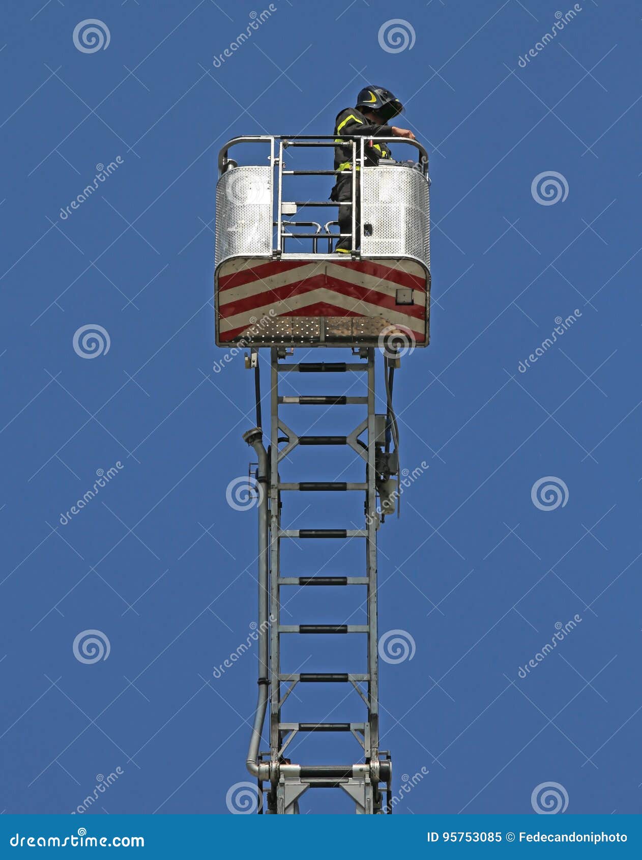 Firefighter Over the Staircase on the Metallic Basket Stock Image ...