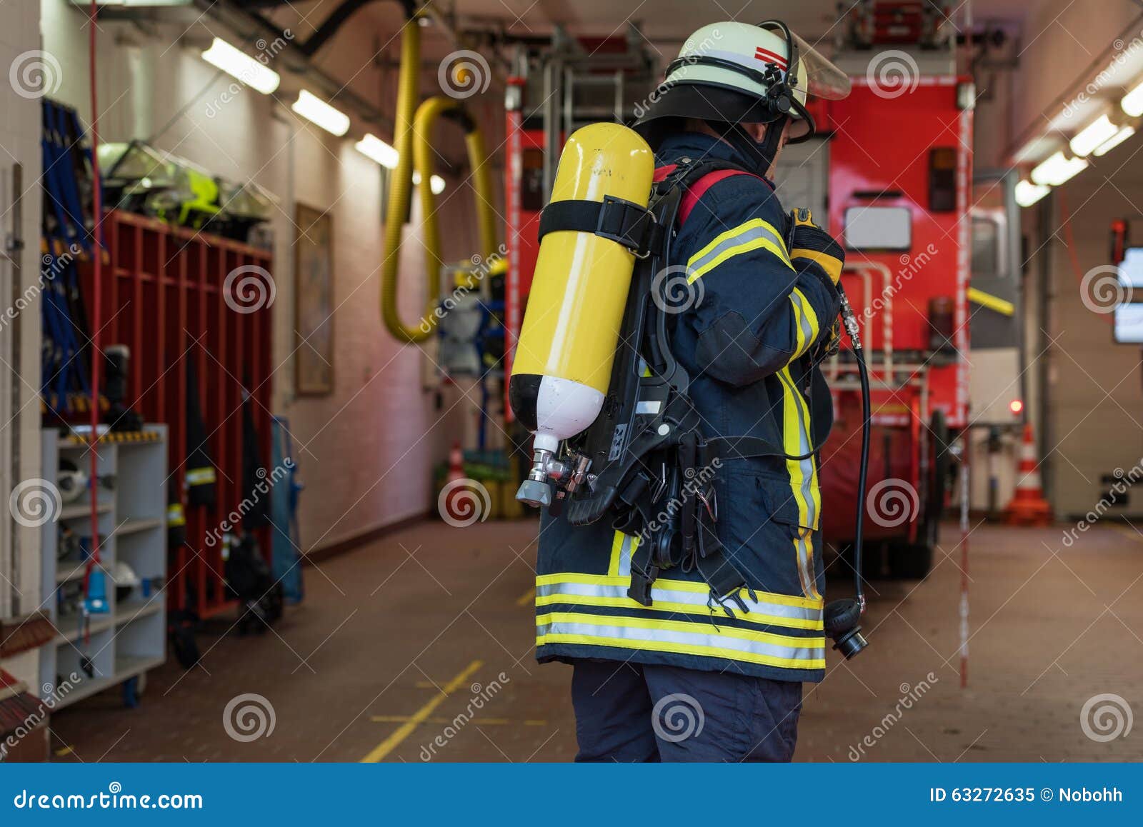 Firefighter With Oxygen Cylinder In The Fire Department Stock Image ...