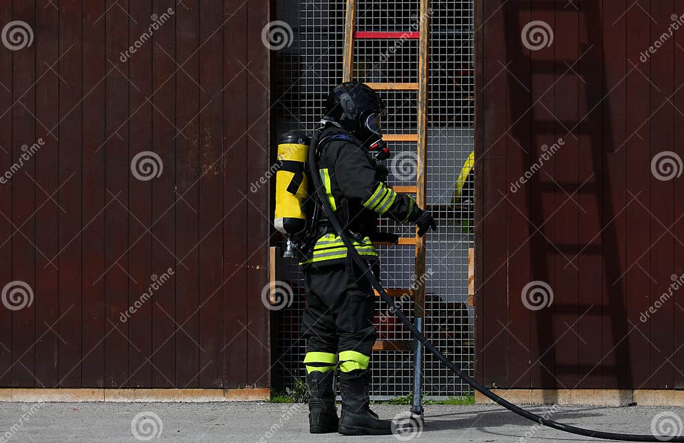 Firefighter with Oxygen Tank during a Training Exercise at the Fire ...
