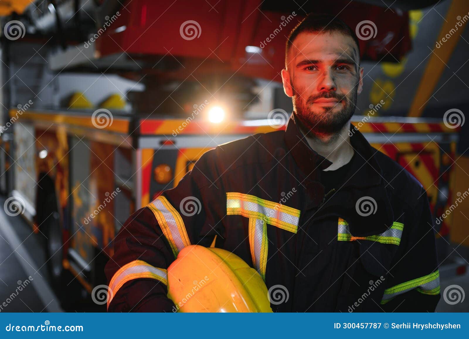 Firefighter Portrait on Duty. Fireman with Helmet Near Fire Engine ...
