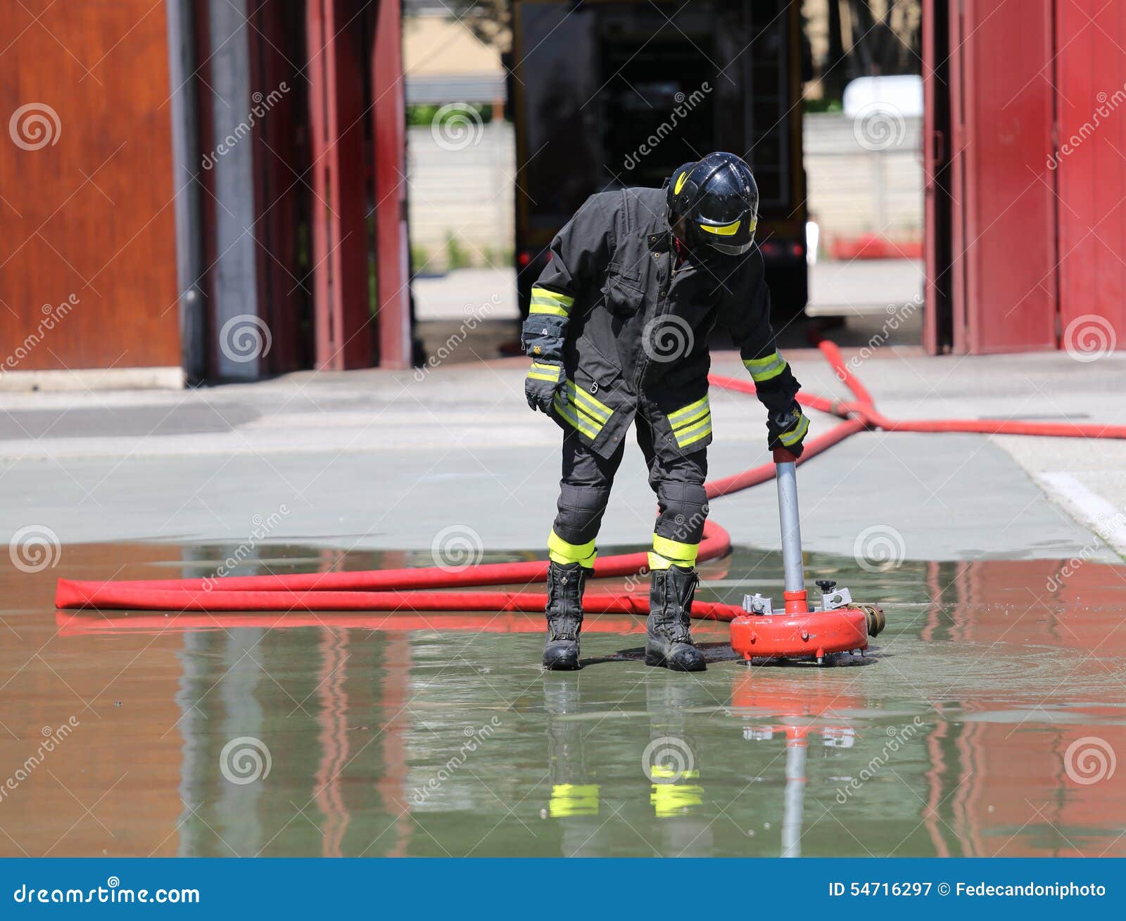 Firefighter Positions a Powerful Fire Hydrant Stock Image - Image of ...