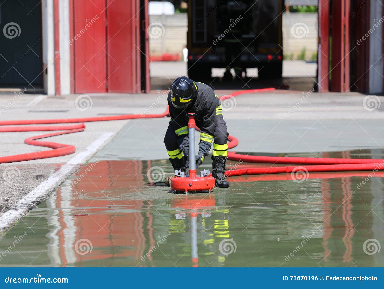 Firefighter Positions a Powerful Fire Hydrant Stock Photo - Image of ...