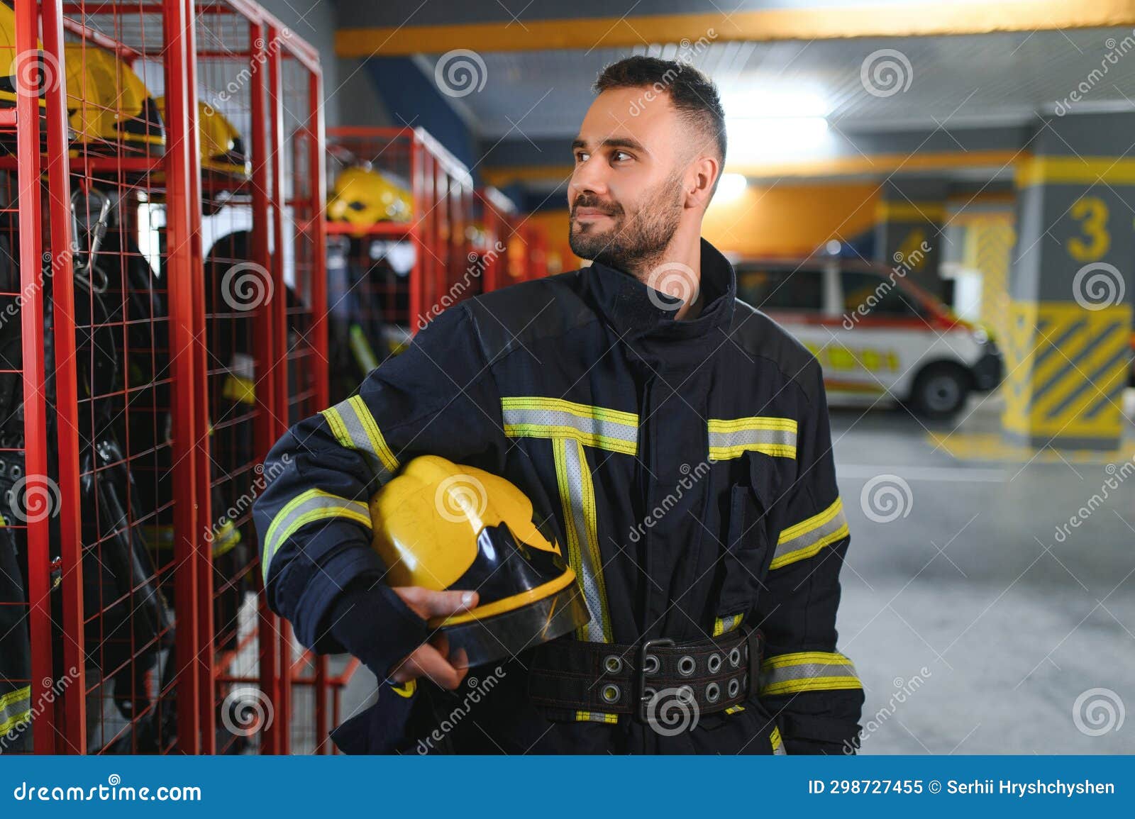 A Firefighter Puts on a Fire Uniform at the Fire Department Stock Image ...