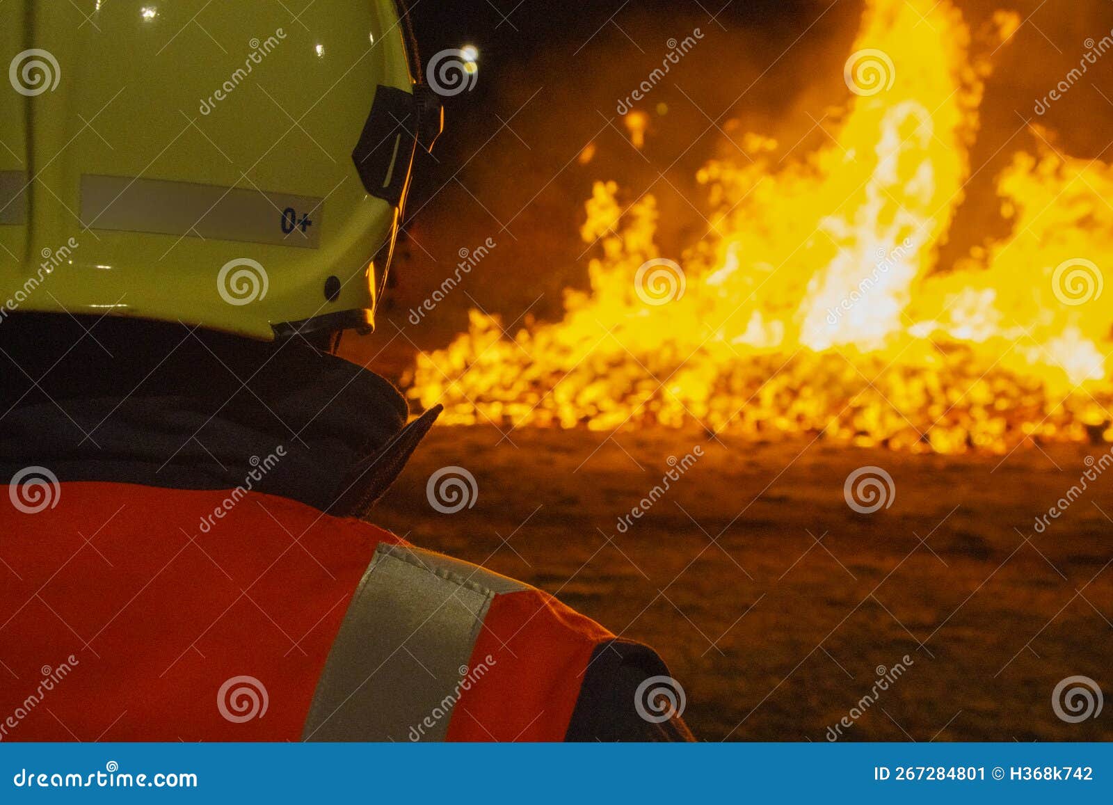 Firefighter Putting Out a Fire. Destruction and Disaster Stock Image ...