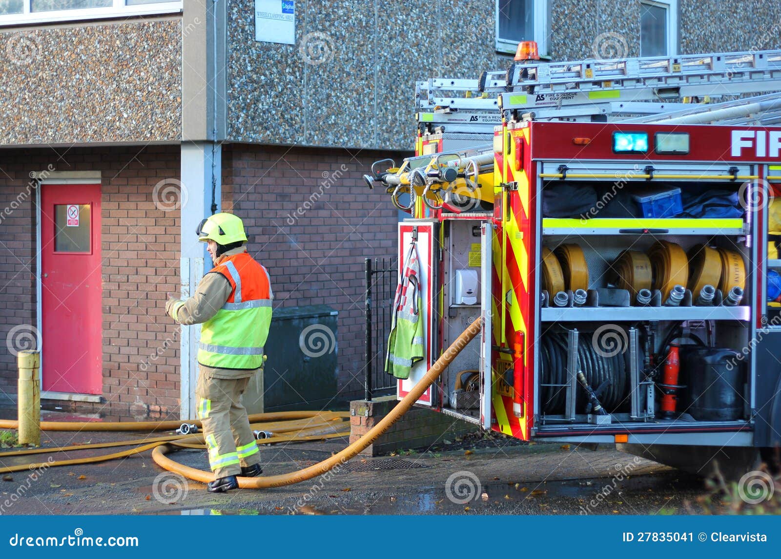 Firefighter at Rear of Fire Truck. Editorial Photo - Image of brigade ...