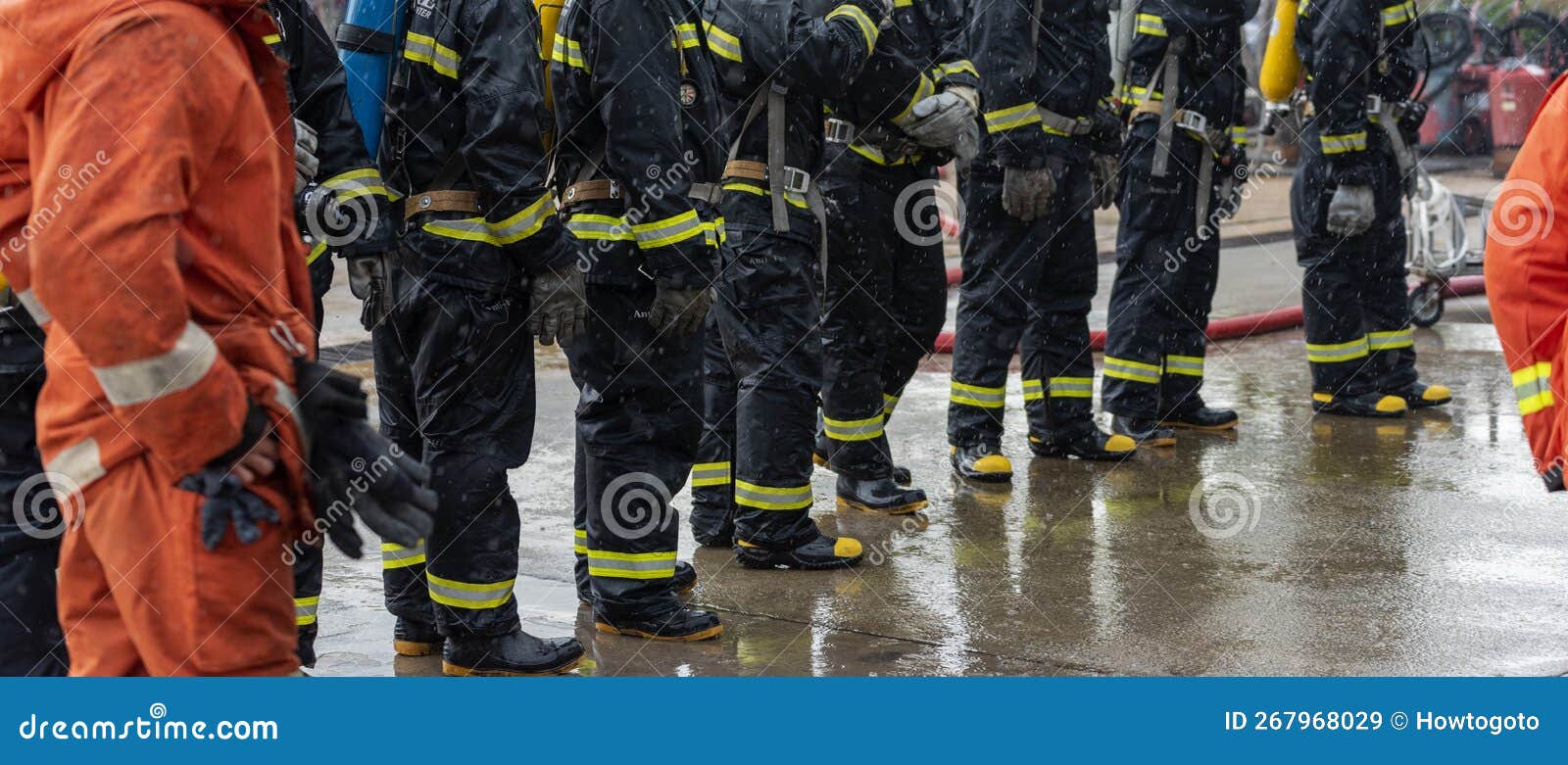 Firefighter Rescue Team Training in Fire Fighting Extinguisher ...
