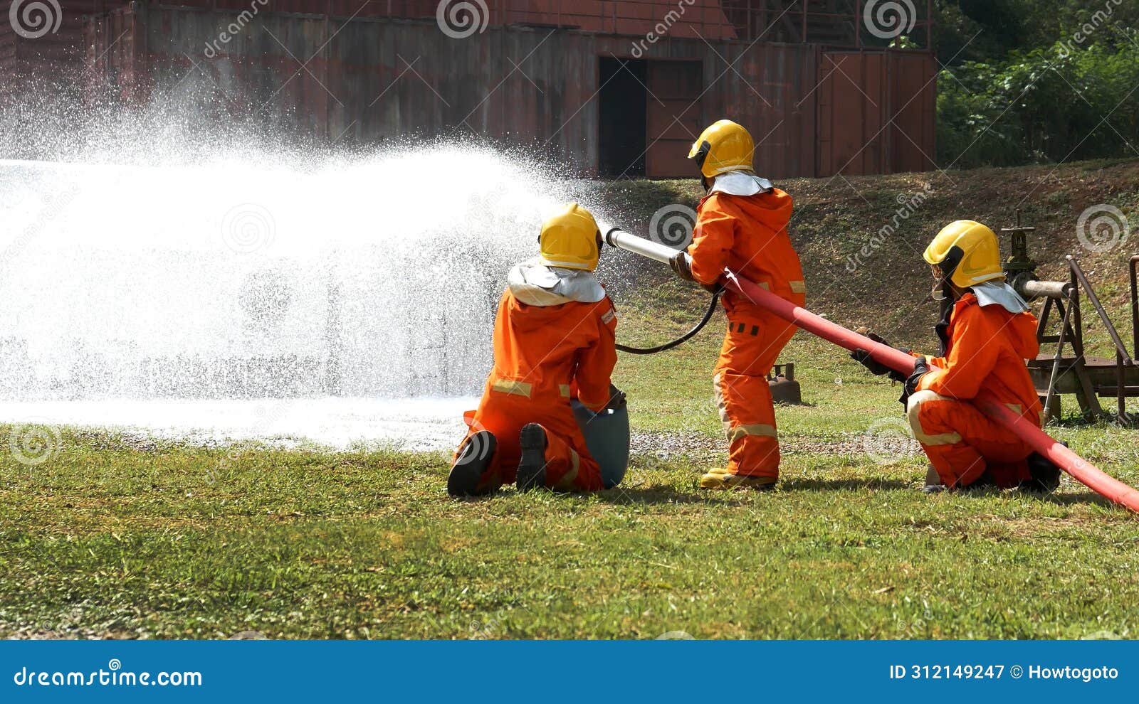 Firefighter Rescue Team Training in Fire Fighting Extinguisher ...