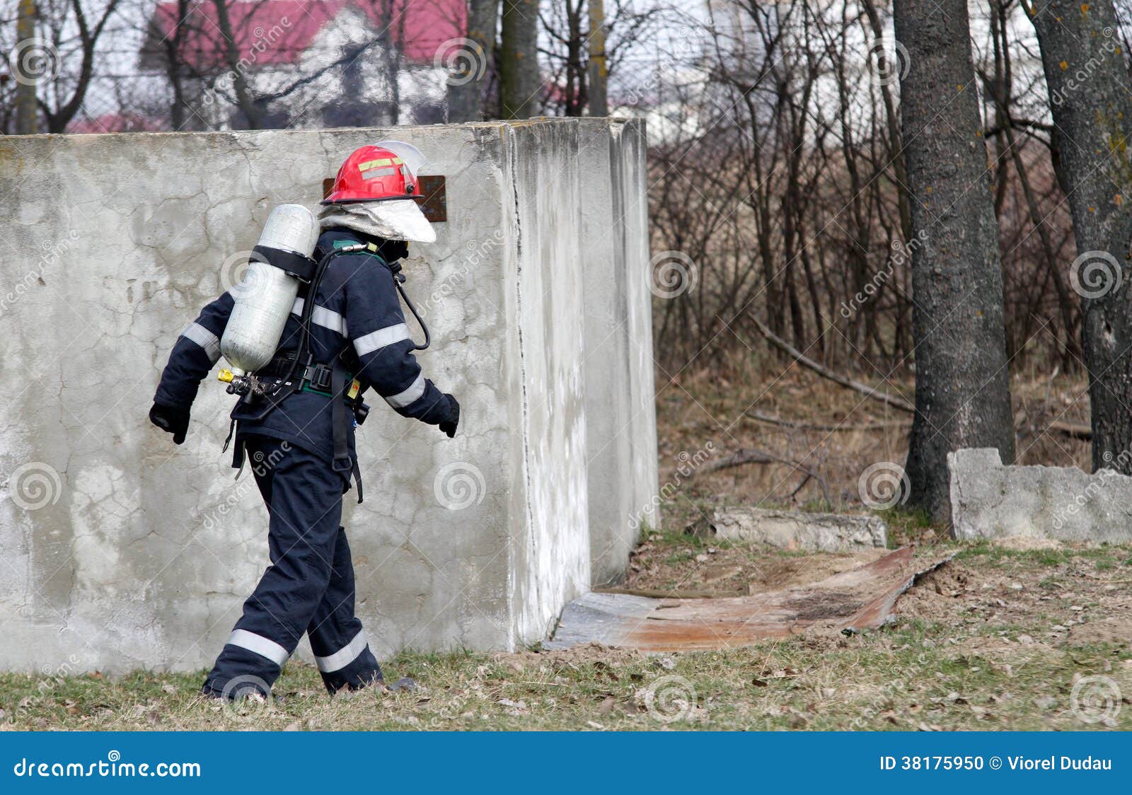 Firefighter in ruins stock photo. Image of equipment - 38175950