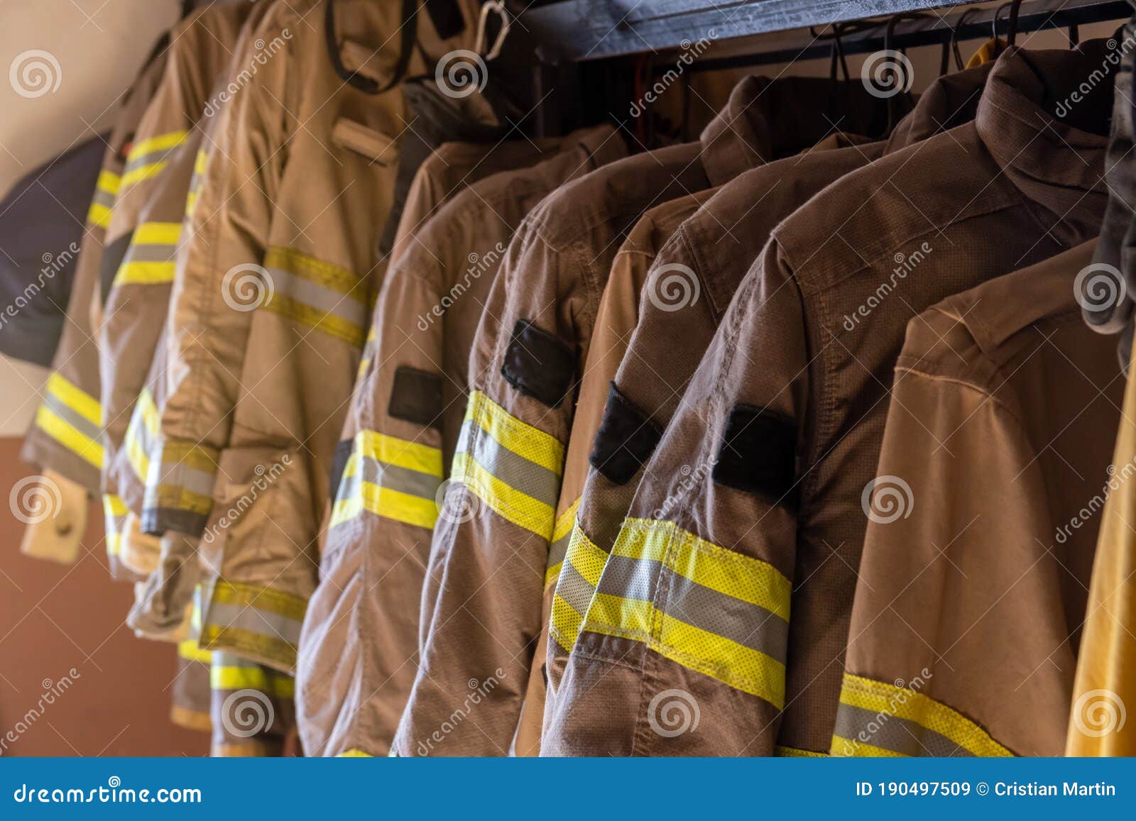 Firefighter`s Uniforms and Gear Arranged at Fire Station Stock Image ...