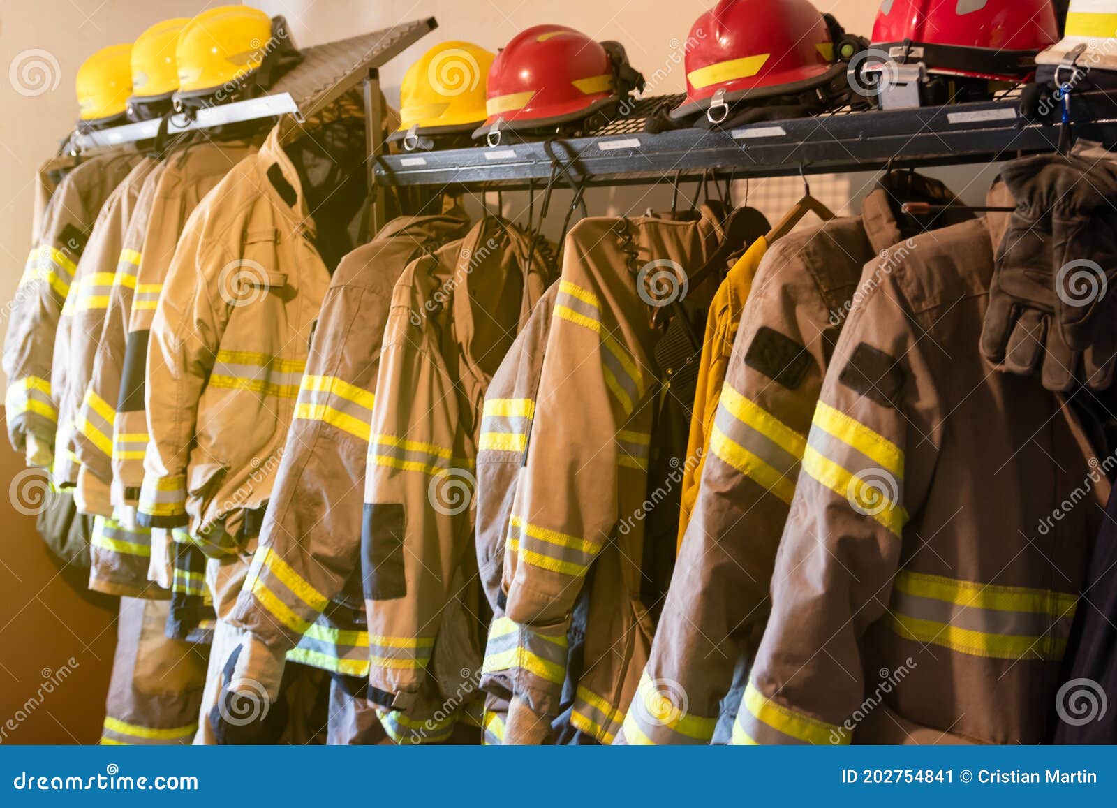 Firefighter`s Uniforms and Gear Arranged at Fire Station Stock Image ...