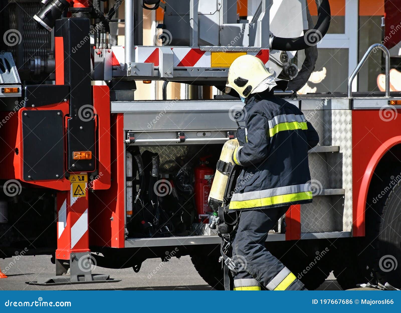 Firefighter at the Scene of a Fire Stock Photo - Image of helmet ...