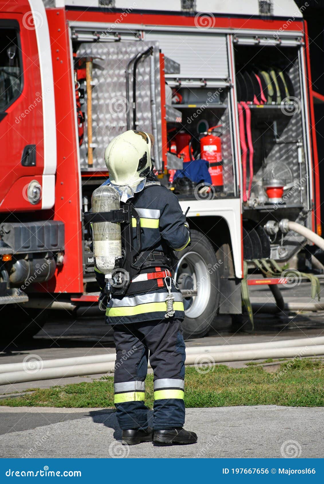 Firefighter at the Scene of a Fire Stock Photo - Image of equipment ...