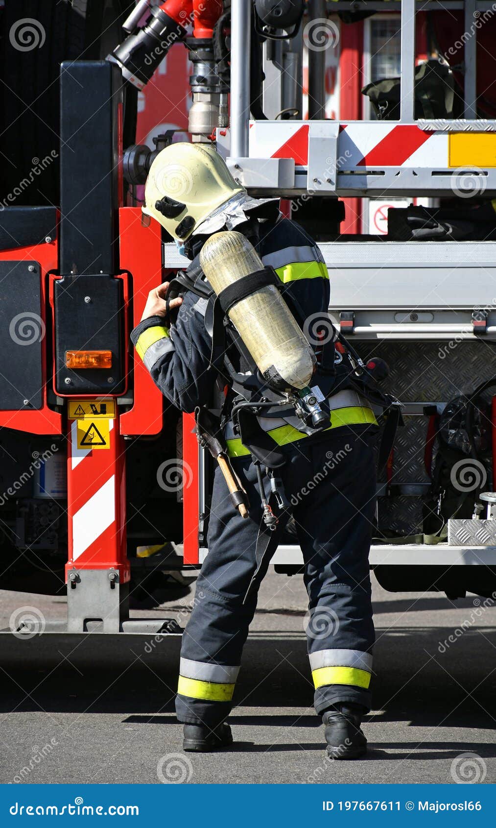 Firefighter at the Scene of a Fire Stock Image - Image of adult, tank ...