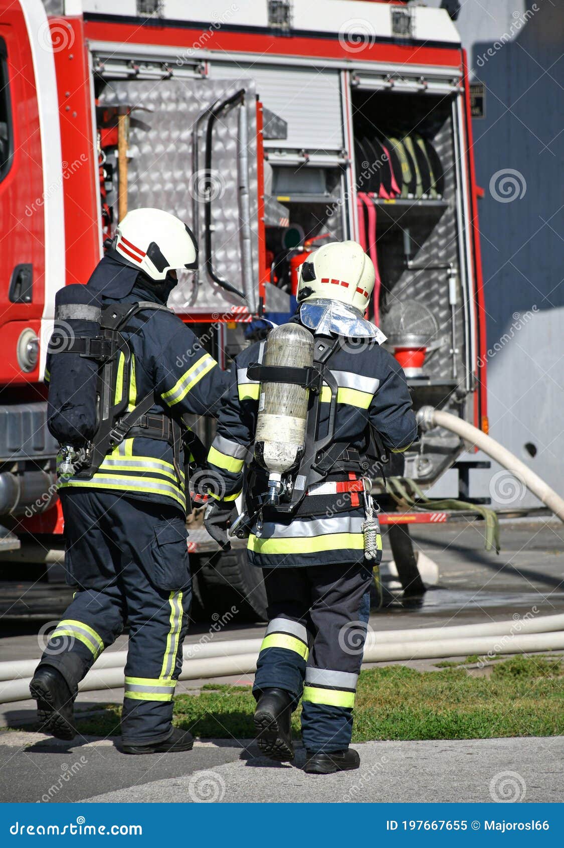 Firefighter at the Scene of a Fire Stock Image - Image of wear, water ...