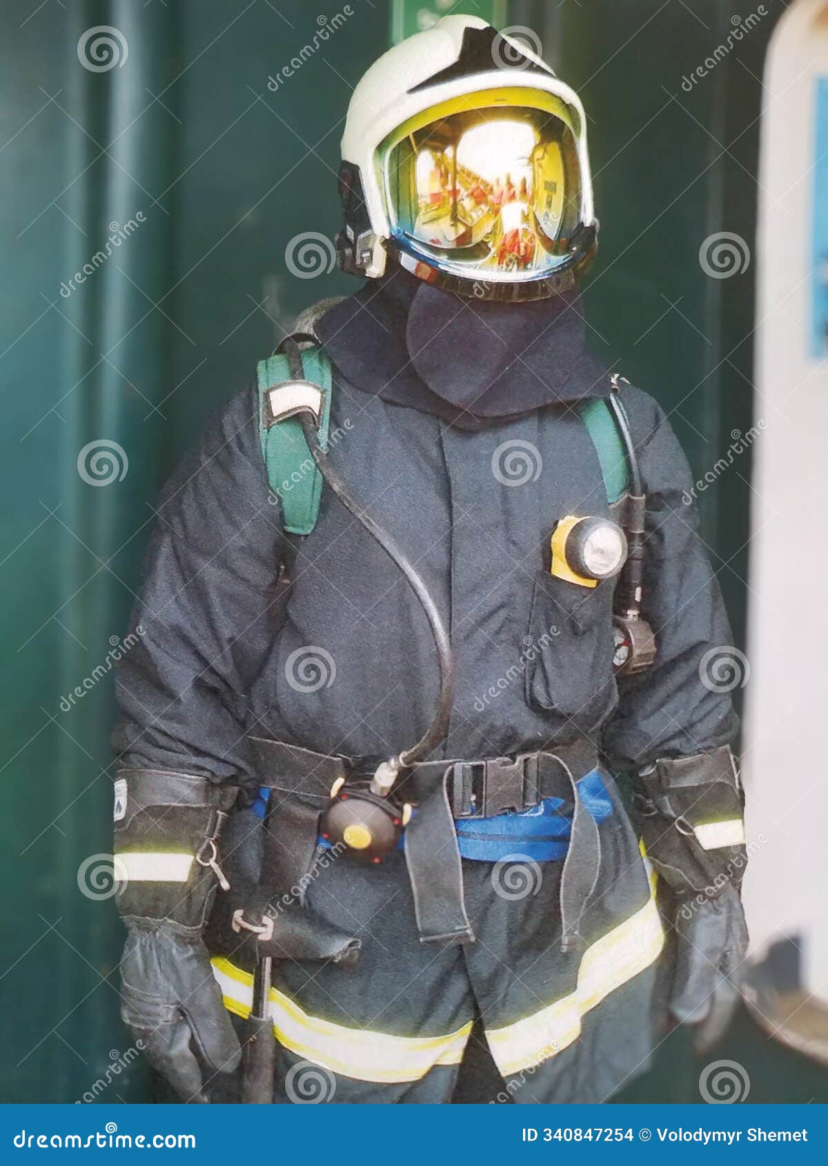 Firefighter on the Ship in Full Uniform and Ready To Extinguish the ...