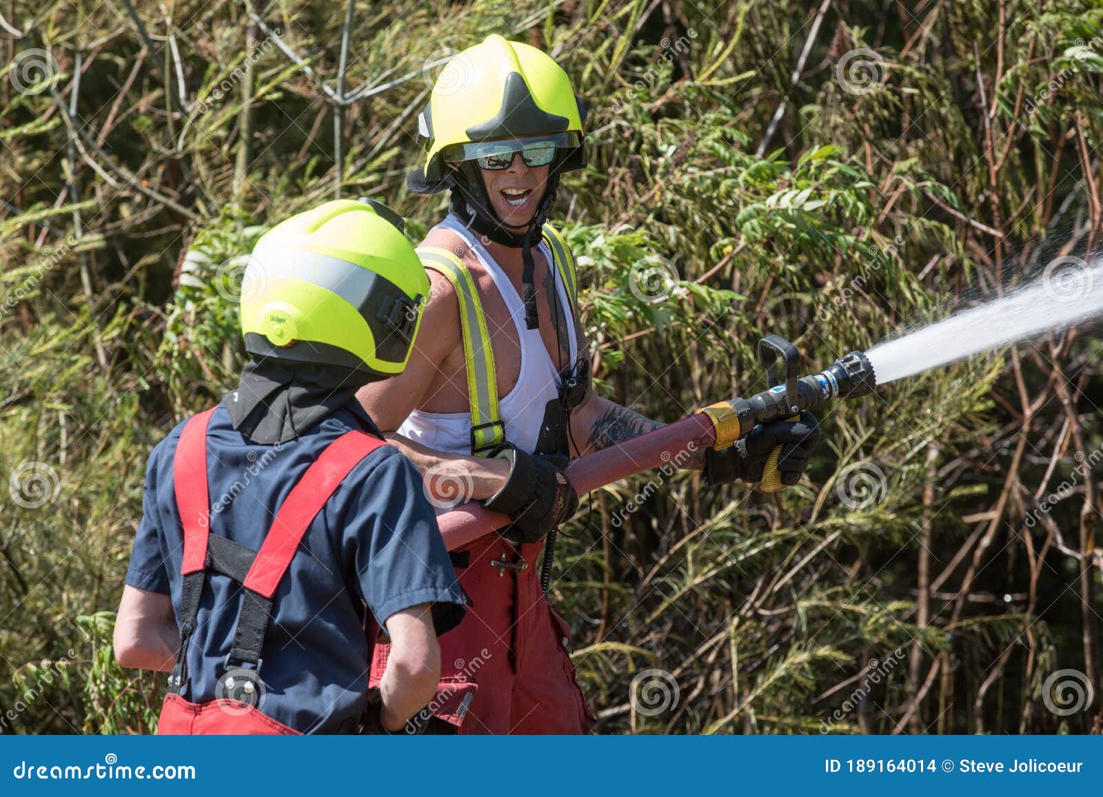 Firefighter Water Spray By High Pressure Fire Hose Editorial Photo ...