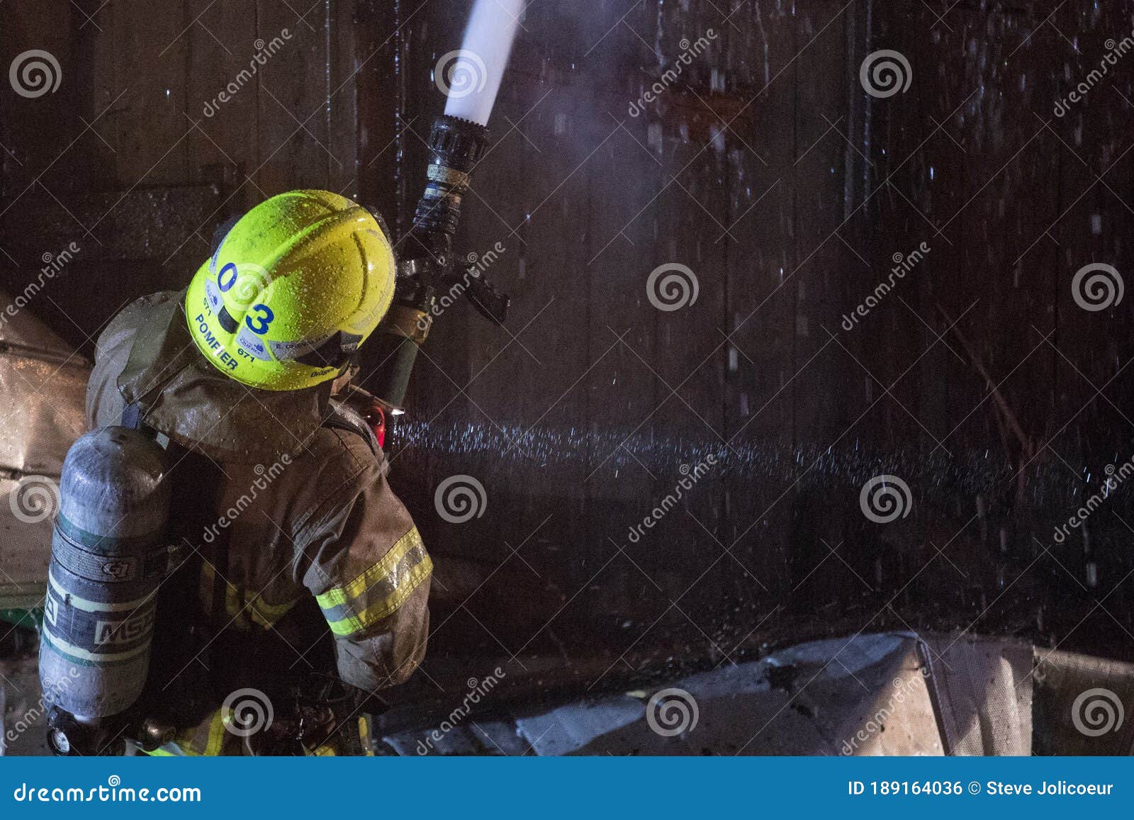 Firefighter Spray Water on Wall. Editorial Photo - Image of fireman ...